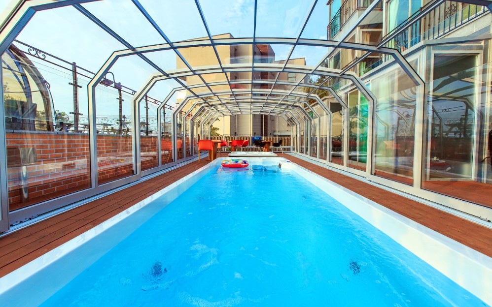 Photo gallery of Pool enclosure Oceanic High - retractable pool cover ...