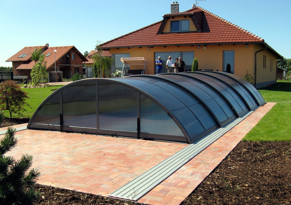 Photo gallery of Pool enclosure Universe NEO - retractable pool cover ...